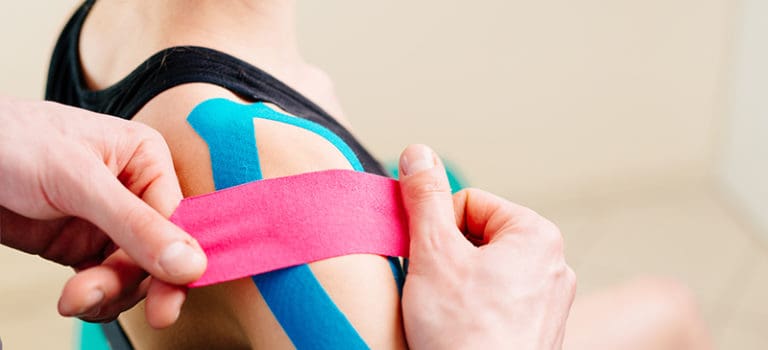 Kinesiology Tape Benefits for Injury & Pain - Dr. Axe